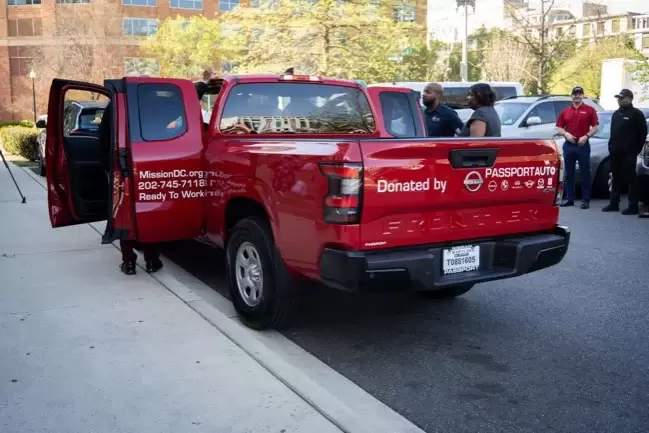 Passport Auto Group Donates Truck